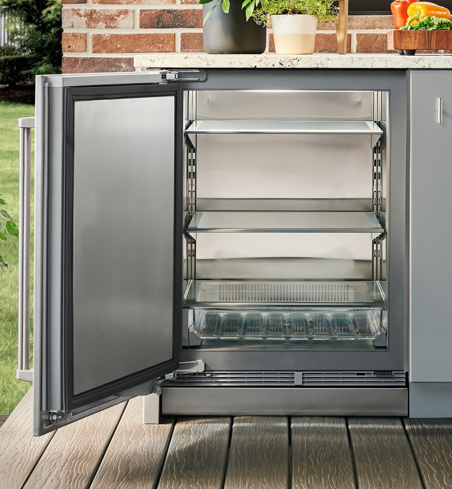 Refrigerador exterior bajo mostrador Designer de 24” Sub-Zero DEU2450RO